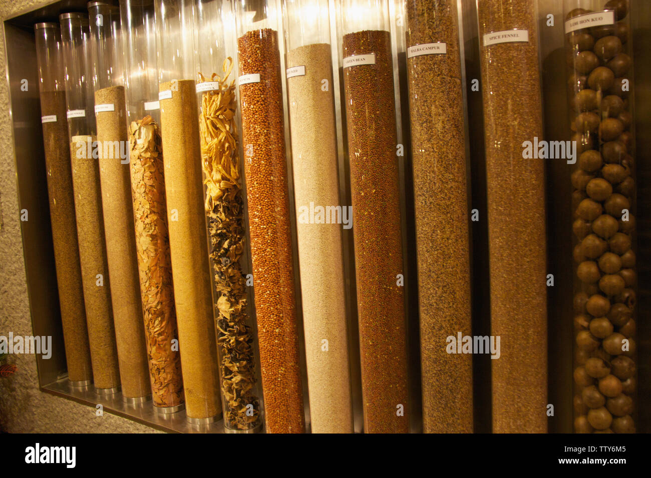 Decorative containers of spices and pulses Stock Photo - Alamy