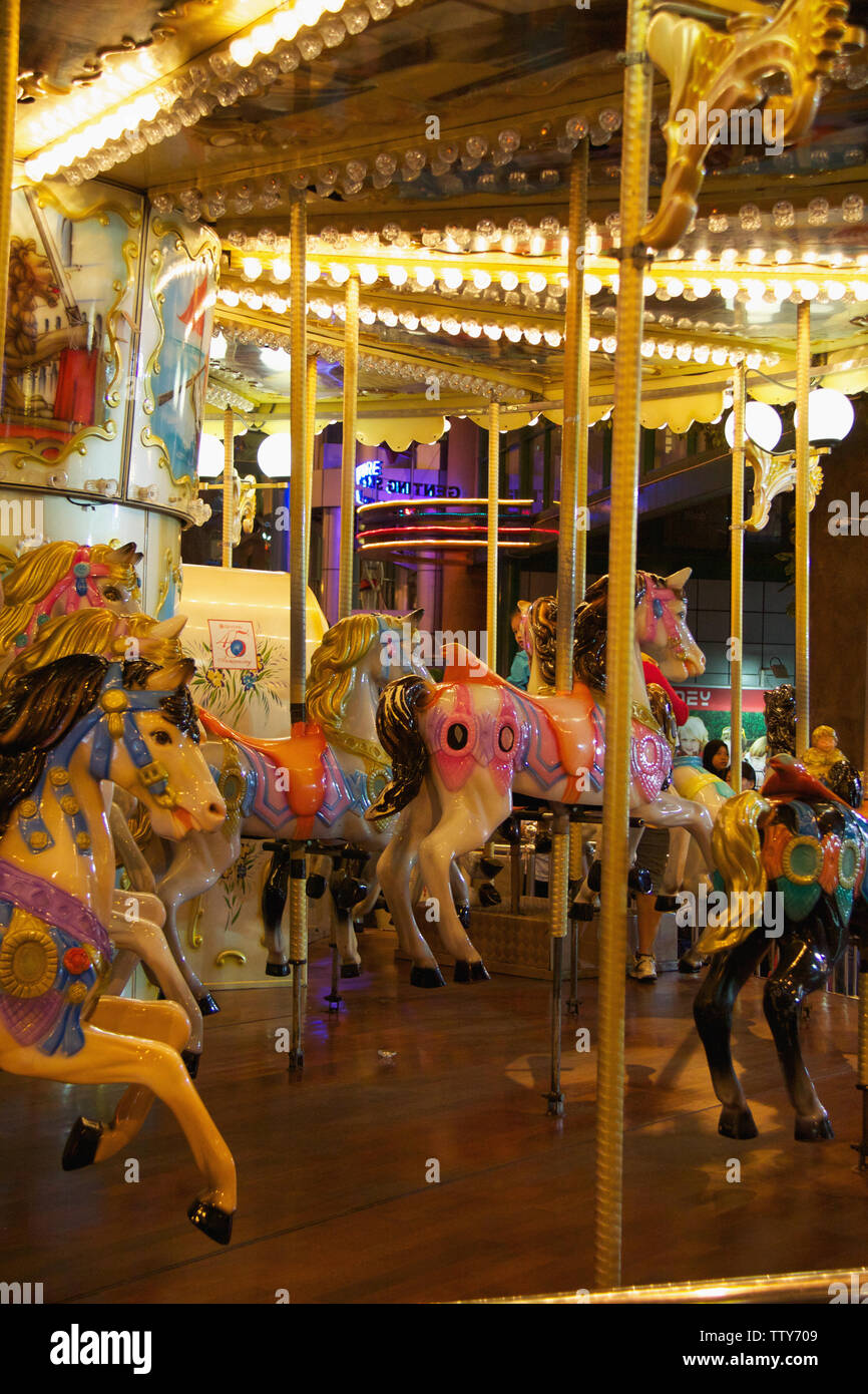 Carousel ride in an amusement park, Genting Highlands, Malaysia Stock ...