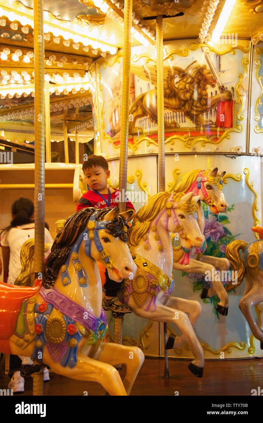 Carousel ride in an amusement park, Genting Highlands, Malaysia Stock ...