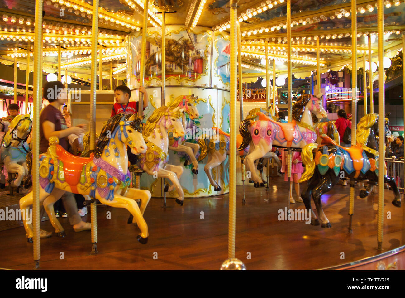 Carousel ride in an amusement park, Genting Highlands, Malaysia Stock ...