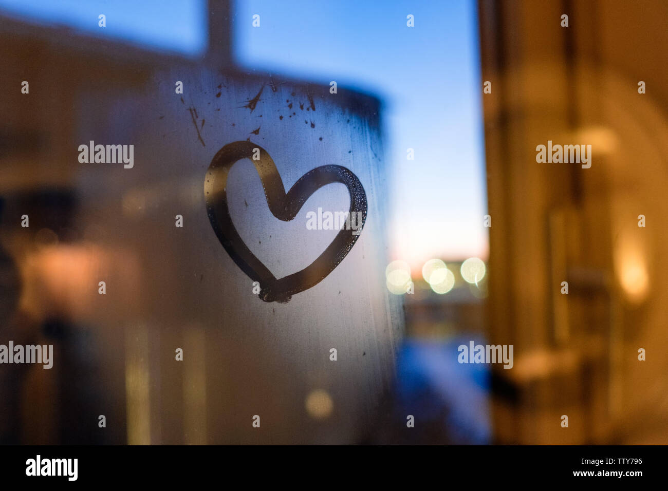 Frosted window winter woman hi-res stock photography and images - Alamy