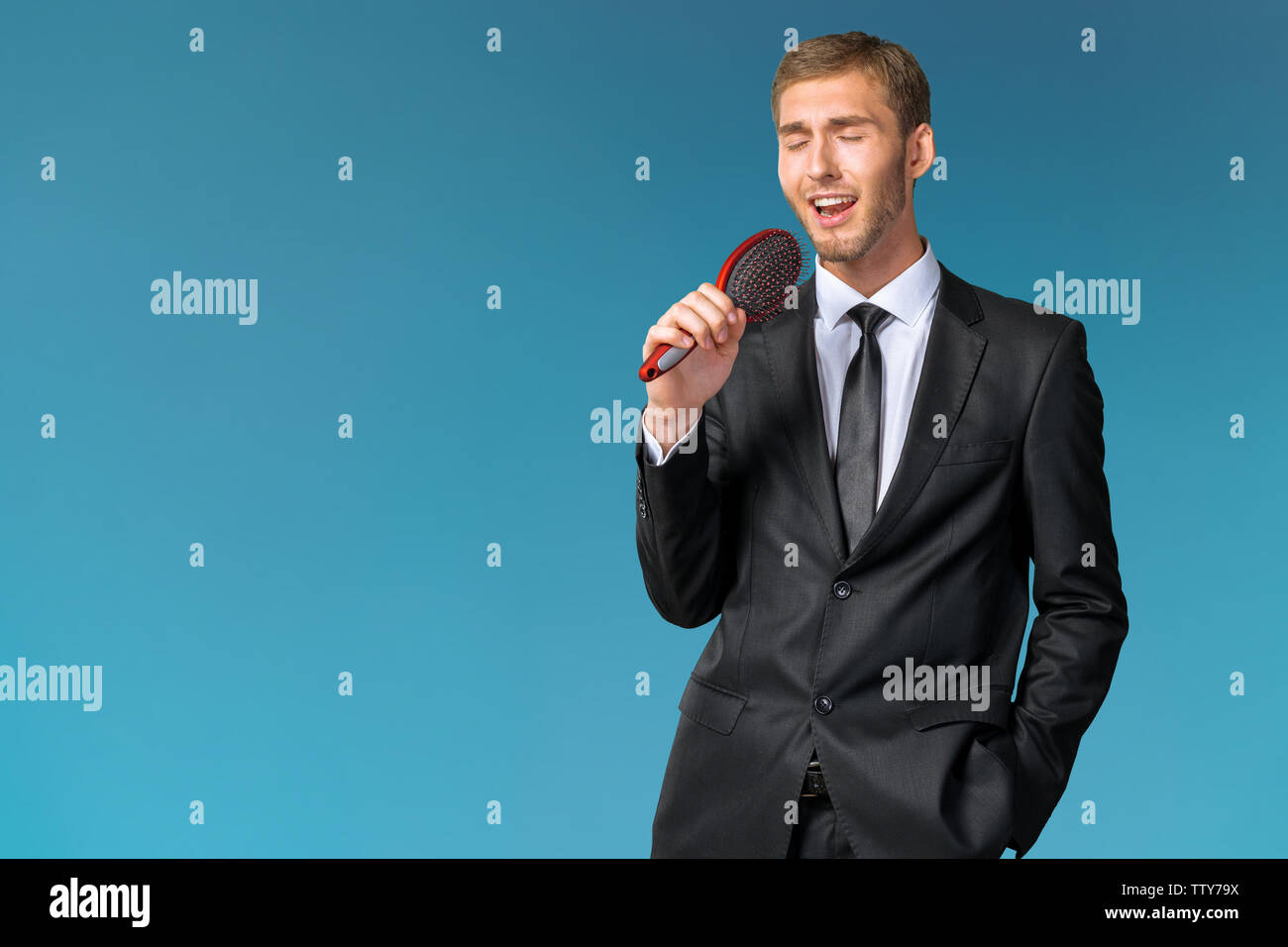 Businessman singing microphone hi-res stock photography and images - Alamy