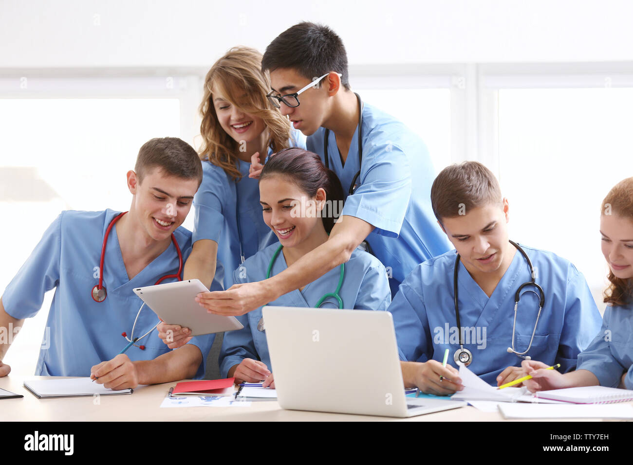 Group of medical students having lecture indoors Stock Photo - Alamy