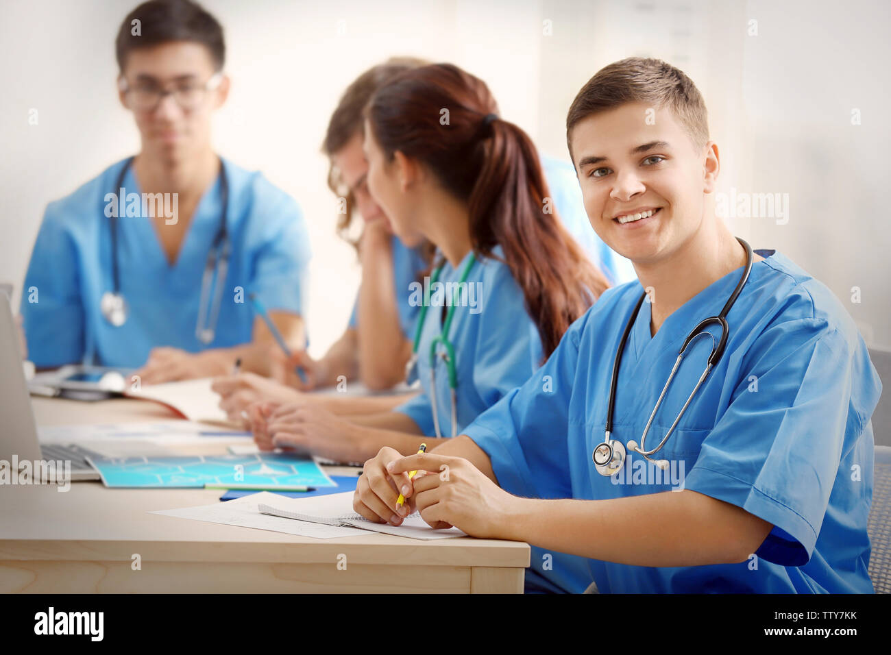 Group of medical students having lecture indoors Stock Photo - Alamy