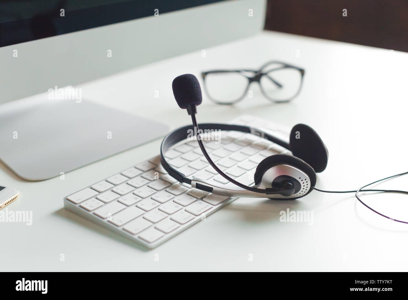 laptop computer with headset Stock Photo - Alamy