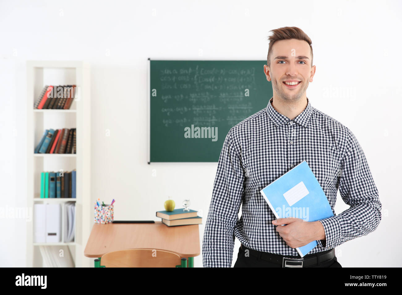 Male science teacher talking hi-res stock photography and images - Alamy