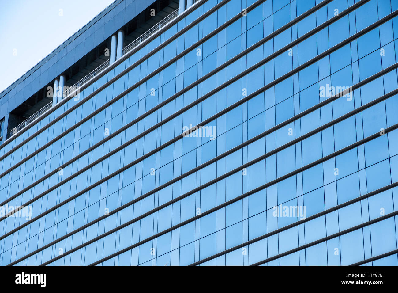 Glossy window modern of skyscraper Stock Photo - Alamy