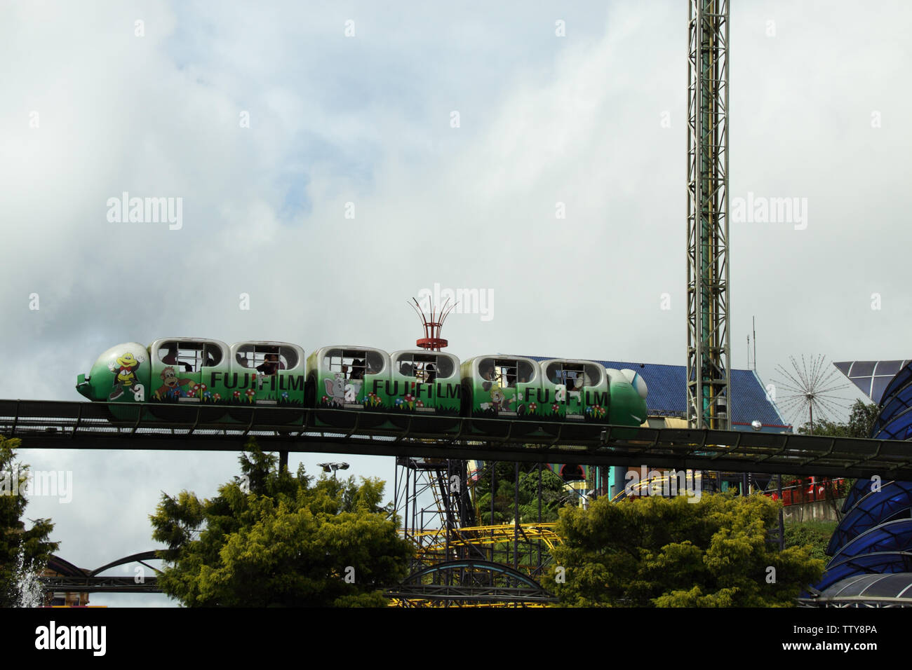 Roller Coaster ride in an amusement park Stock Photo - Alamy