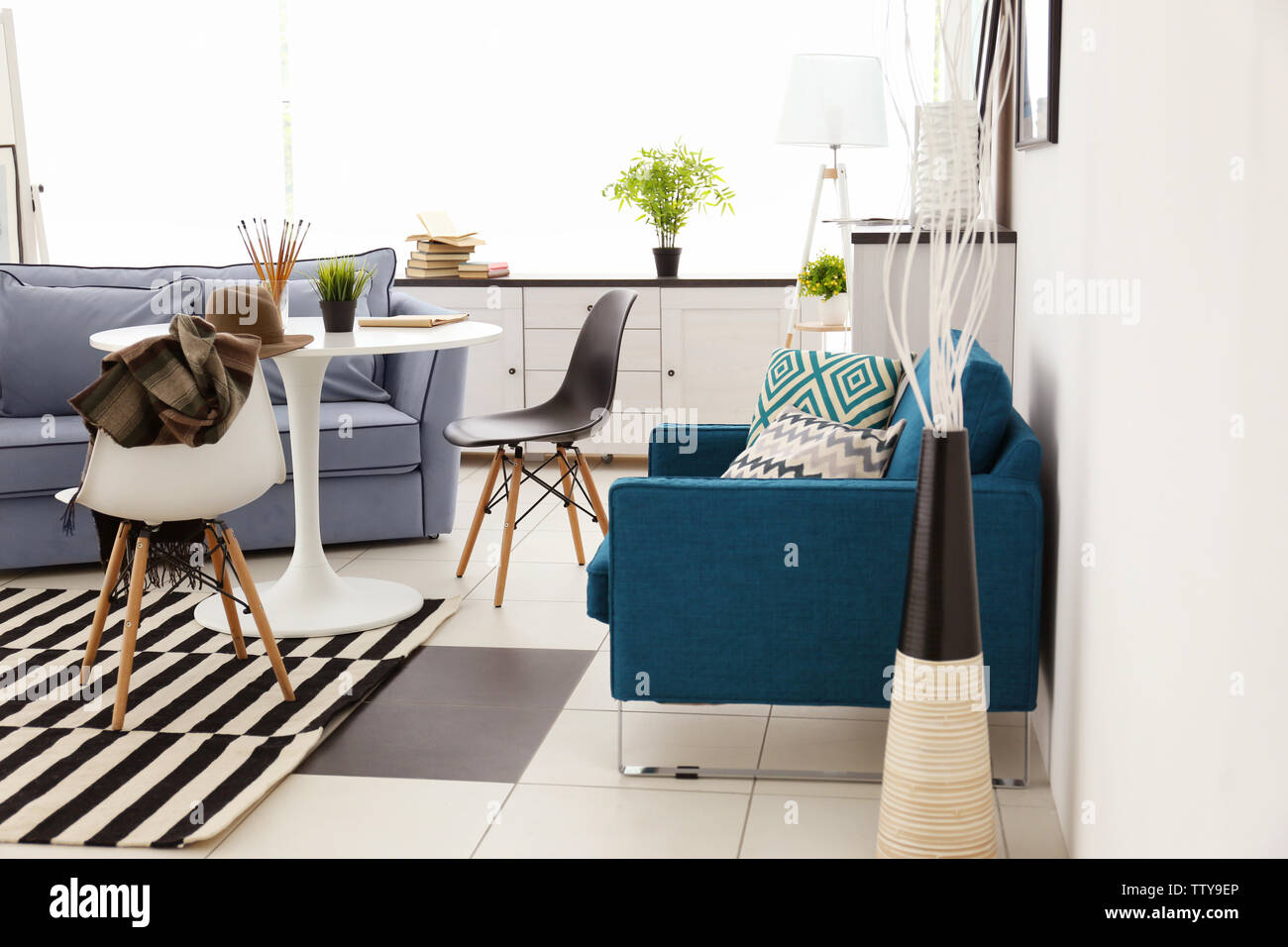 Modern interior on light background Stock Photo - Alamy