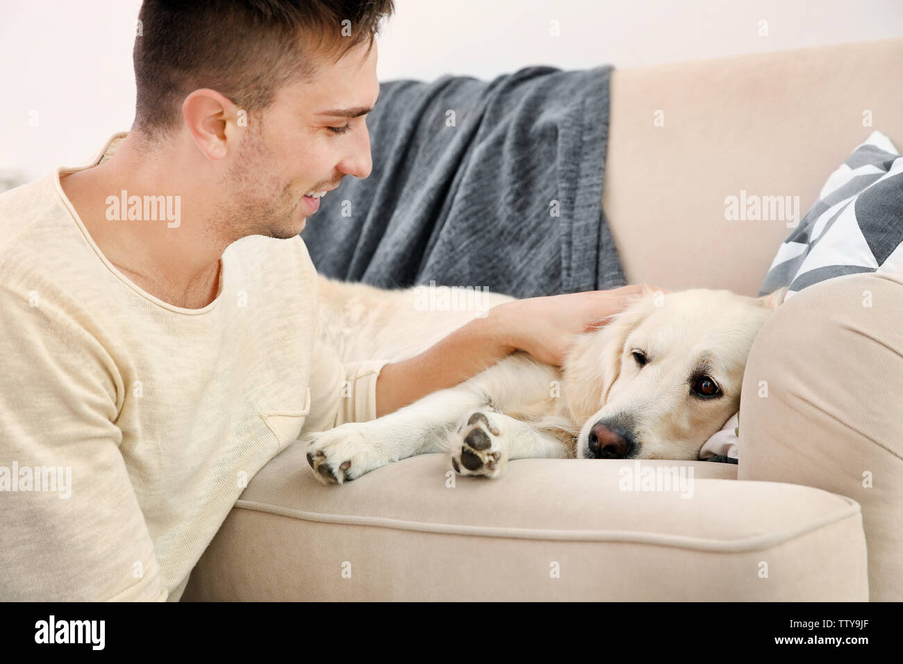 Handsome male friends sleeping hi-res stock photography and images - Alamy