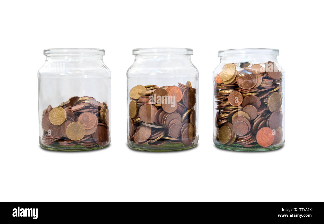 Three glass jars holding coins Stock Photo - Alamy