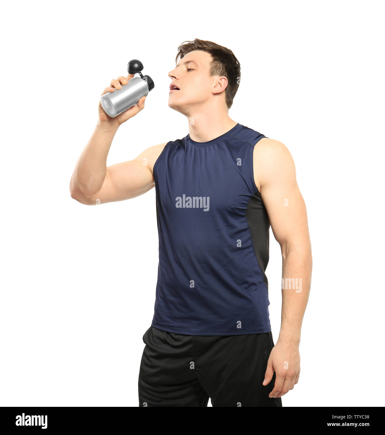 Young handsome sportsman on white background Stock Photo - Alamy