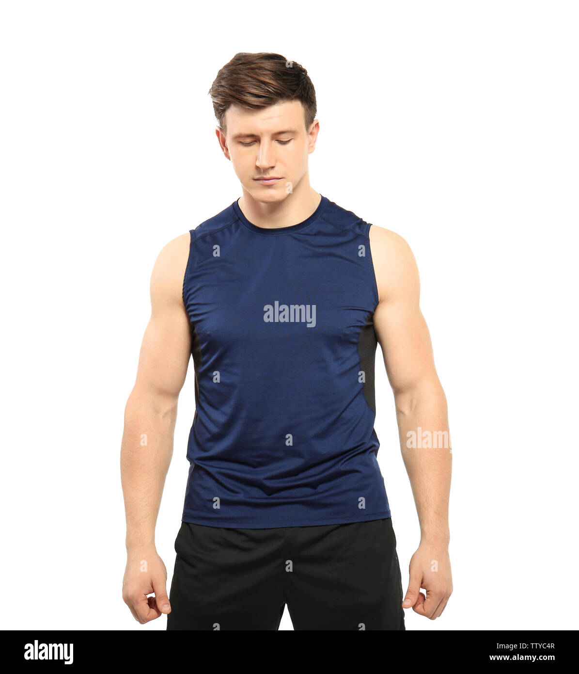 Young handsome sportsman on white background Stock Photo - Alamy
