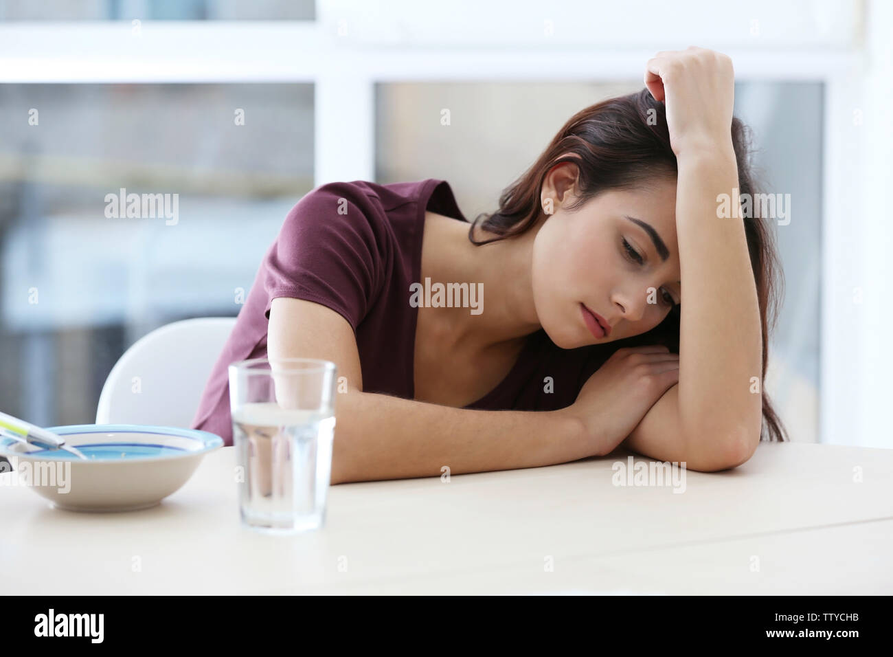 Sad girl portrait kitchen interior hi-res stock photography and images ...