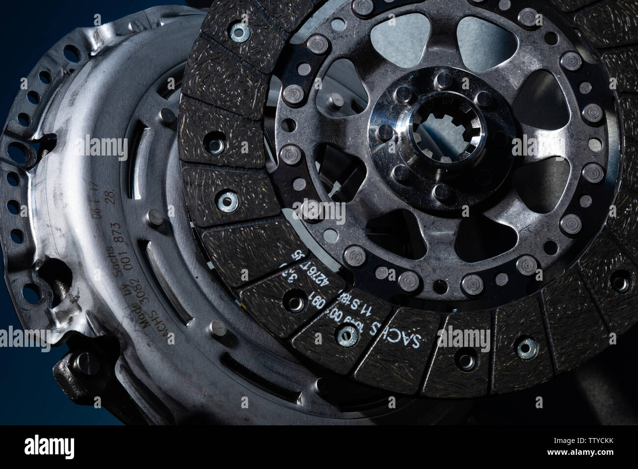 Shot of modern new spare parts for car in the muffled lighting made ...