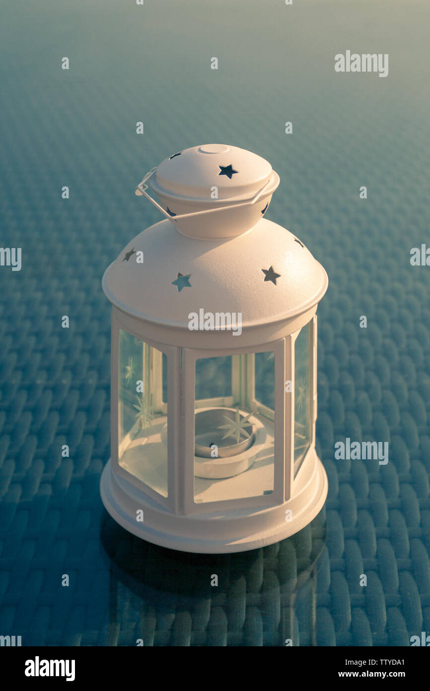 Candle lights in the setting sun Stock Photo - Alamy