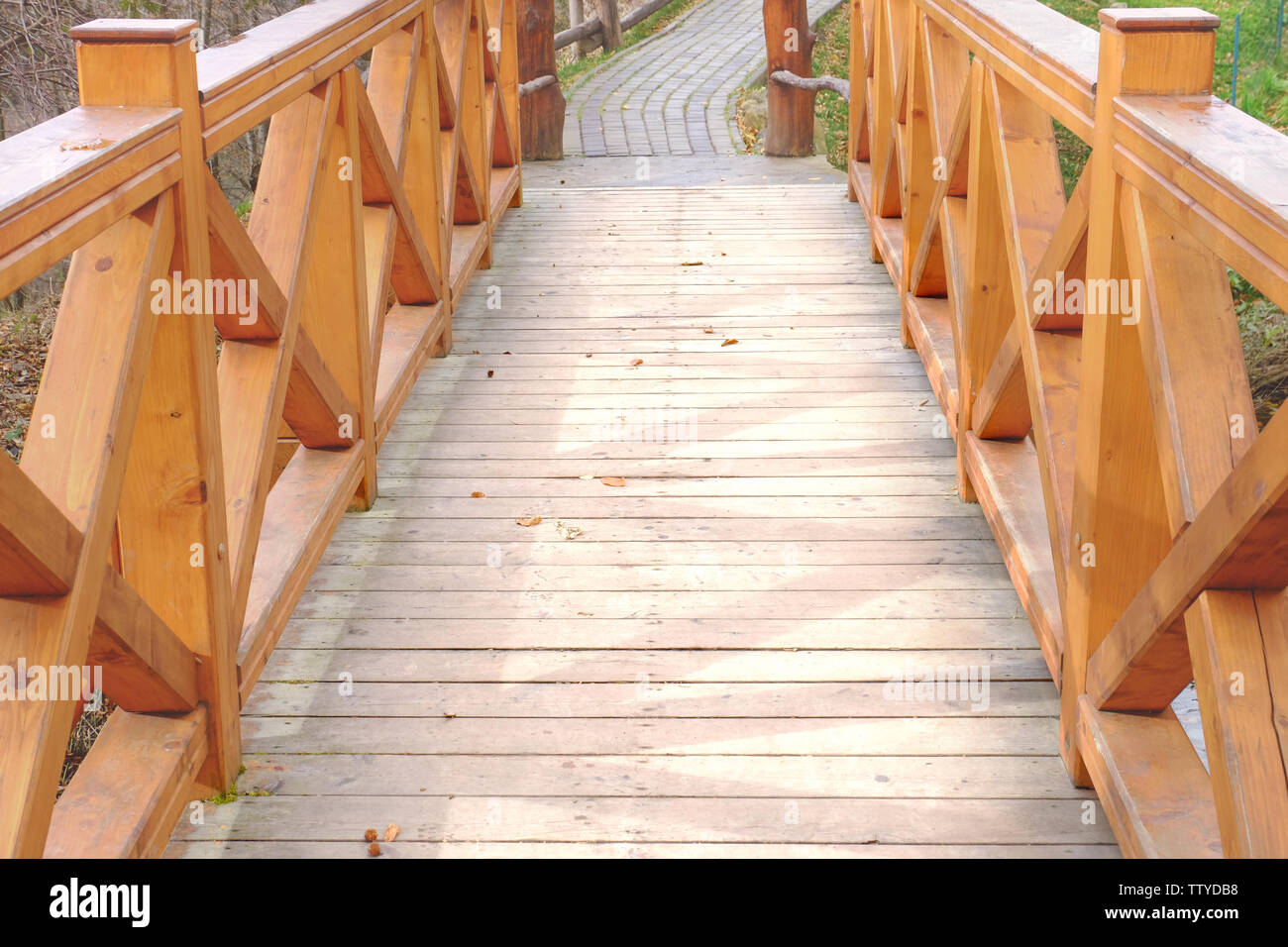 Modern wooden bridge in resort Stock Photo - Alamy