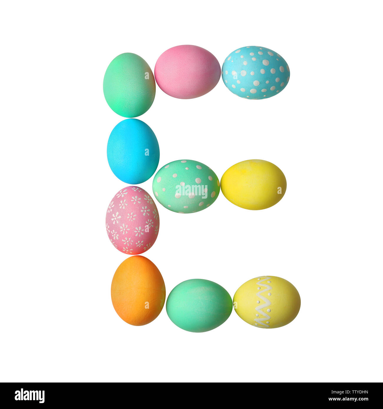 Letter E made of Easter eggs on light background Stock Photo - Alamy
