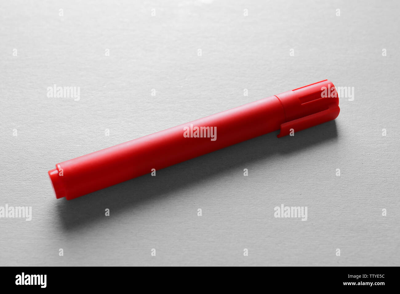 Red felt pen on light background Stock Photo - Alamy