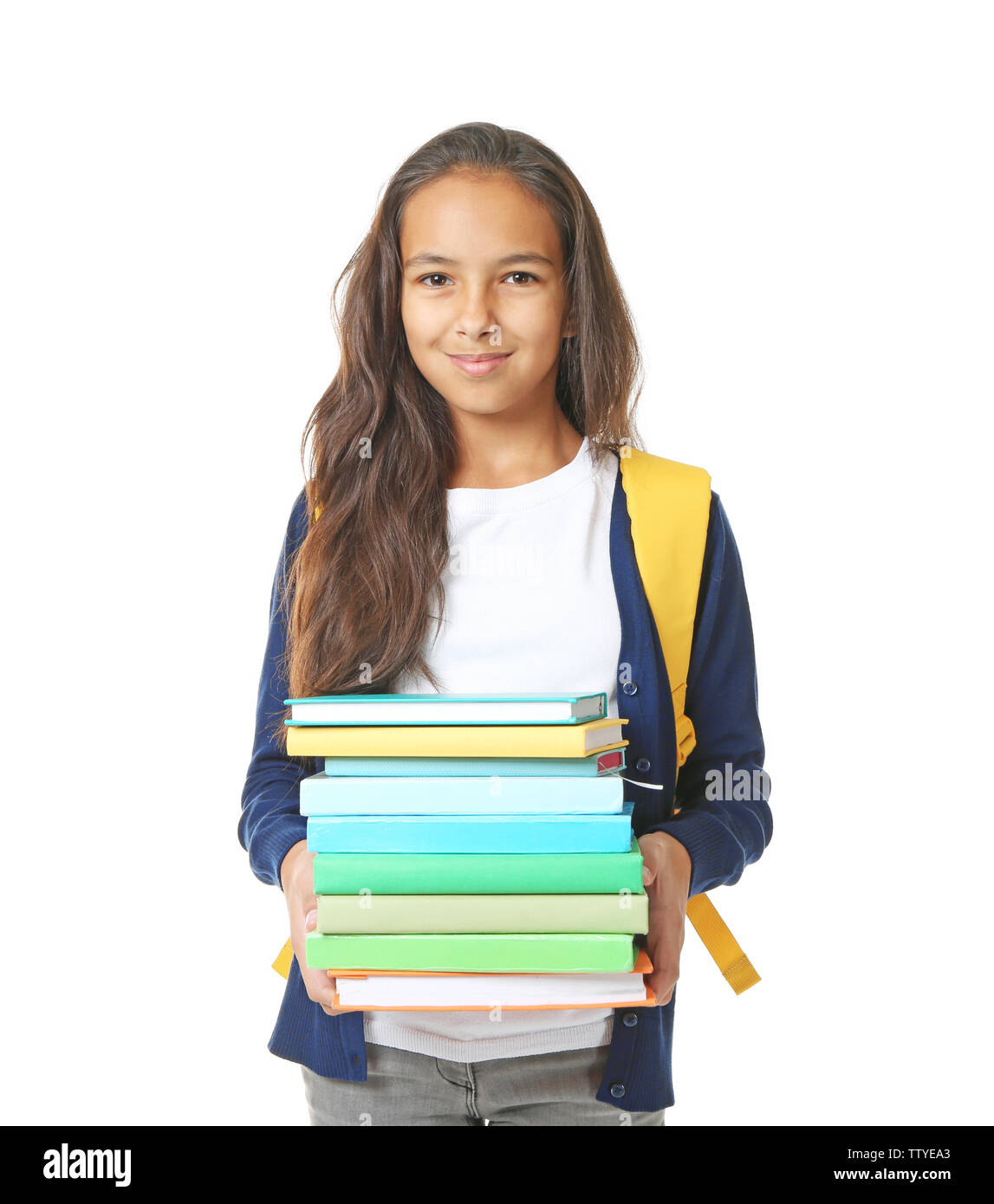 Cute schoolgirl with books on white background Stock Photo - Alamy