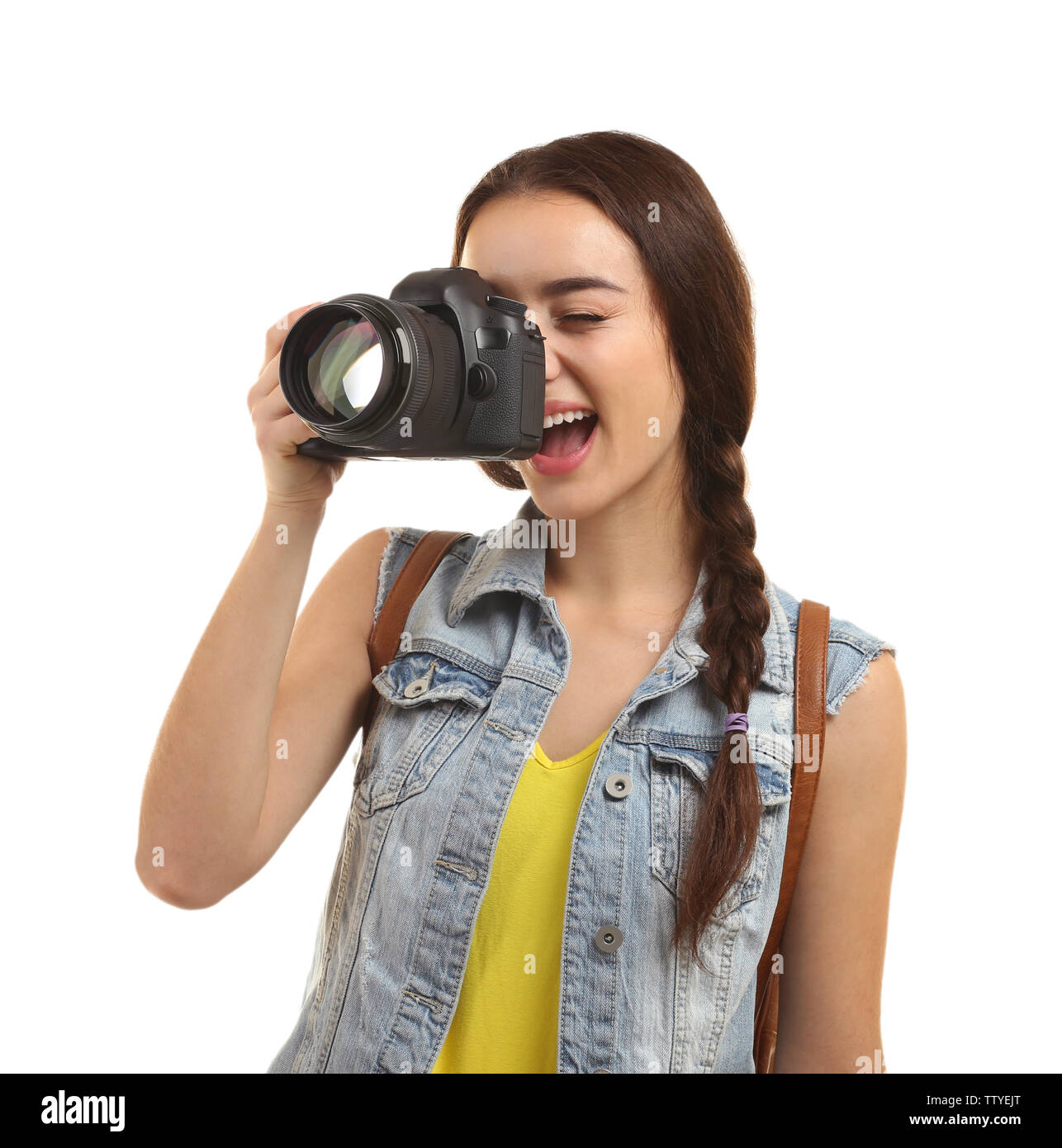 Beautiful female tourist with camera on white background Stock Photo ...