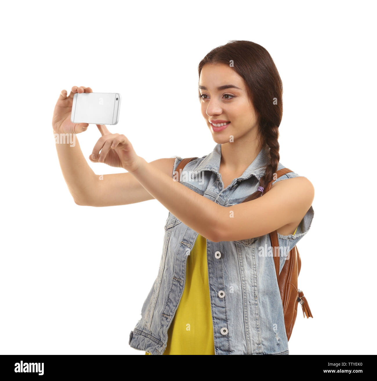 Beautiful woman taking photo using mobile phone, on white background ...
