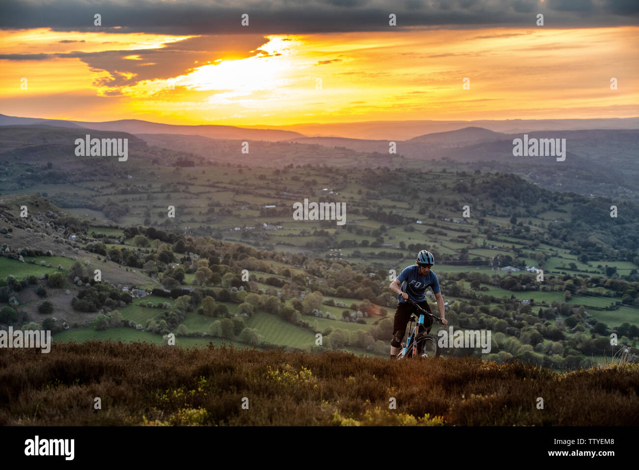 A man rides an ebike from the summit of The Blorenge in the Brecon ...