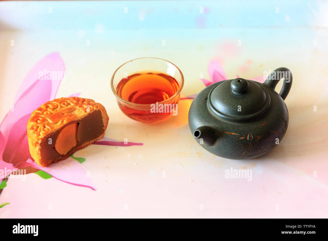 Moon cakes, tea, fruit Stock Photo - Alamy