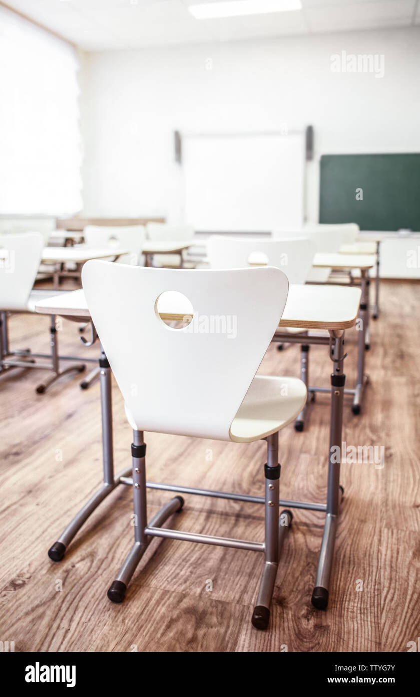 Empty classroom with chairs and desks Stock Photo - Alamy