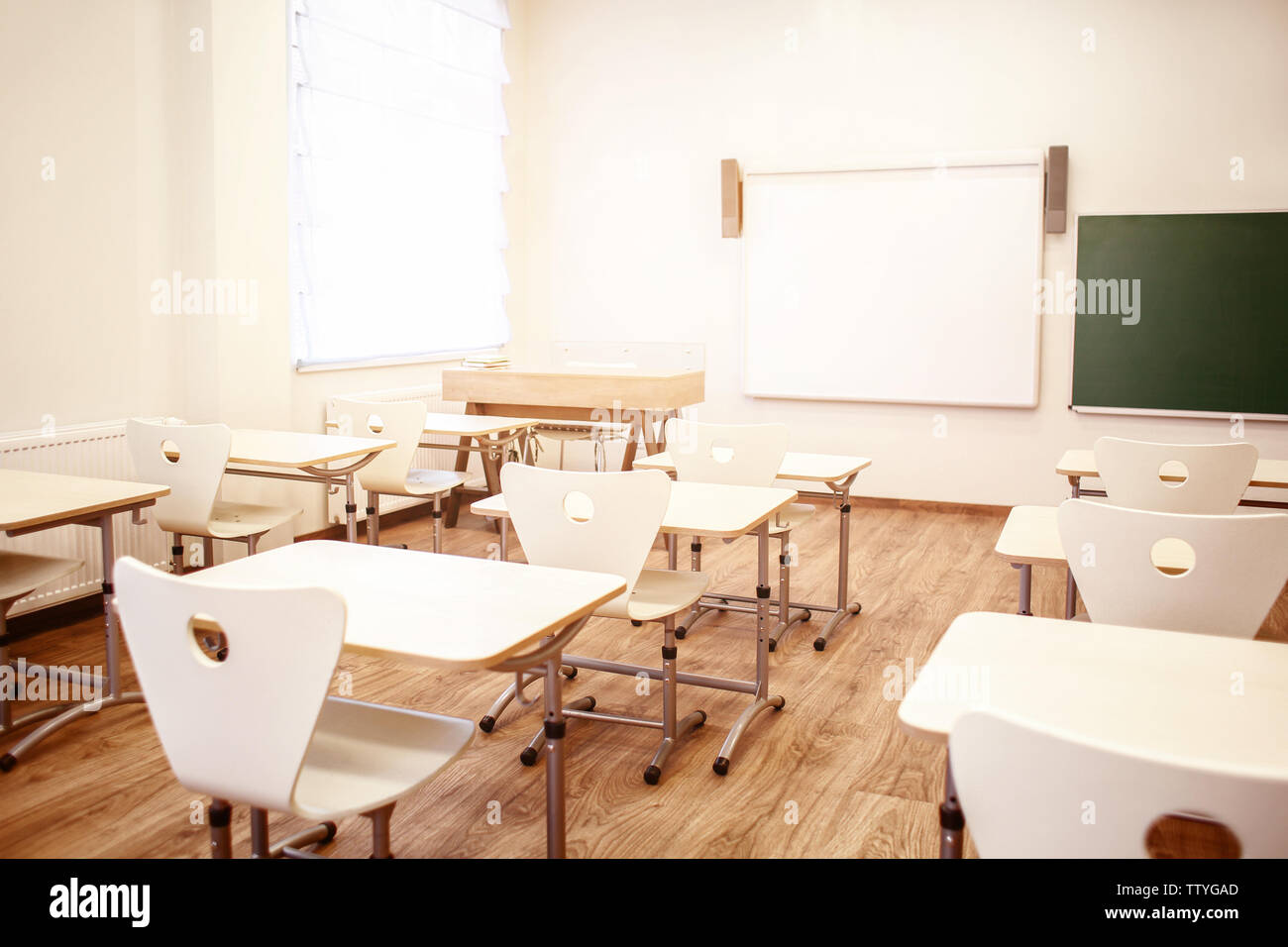Empty classroom with chairs and desks Stock Photo - Alamy