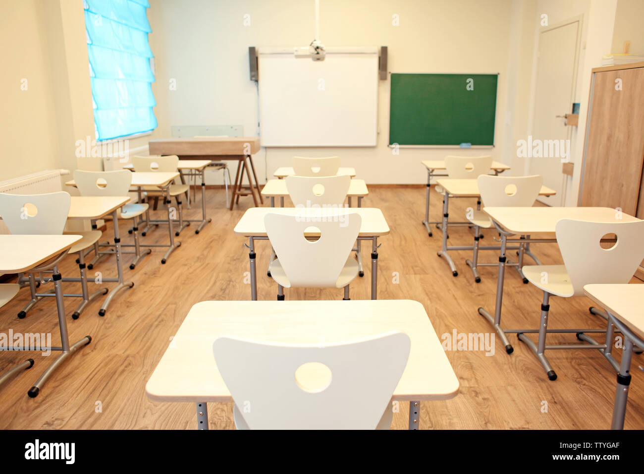 Empty classroom with chairs and desks Stock Photo - Alamy