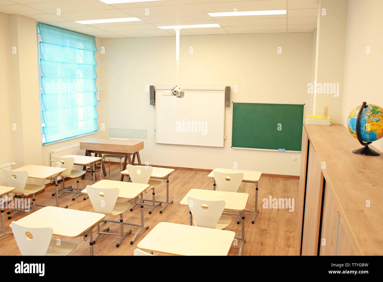 Empty classroom with chairs and desks Stock Photo - Alamy