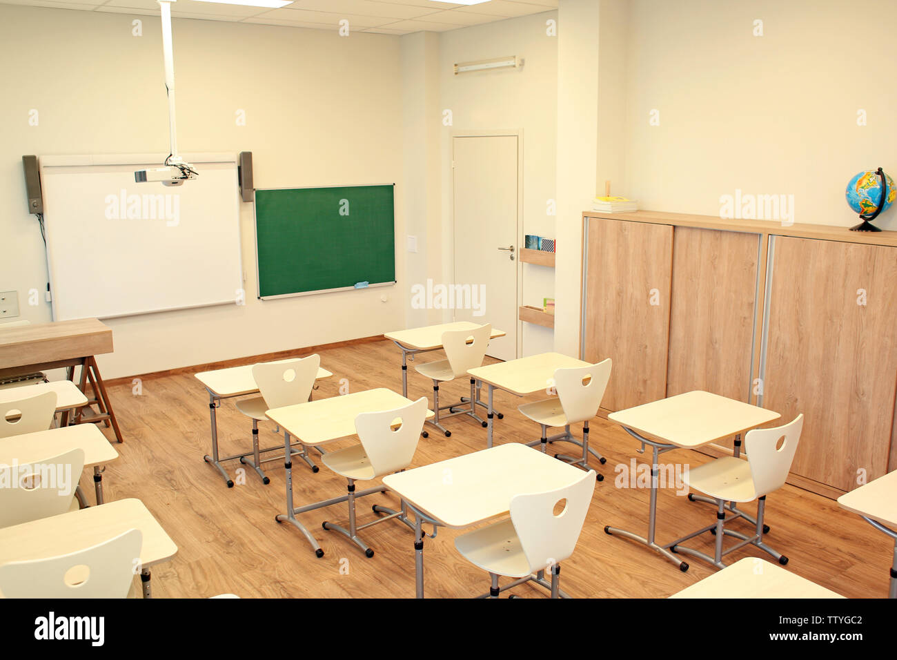 Empty classroom with chairs and desks Stock Photo - Alamy