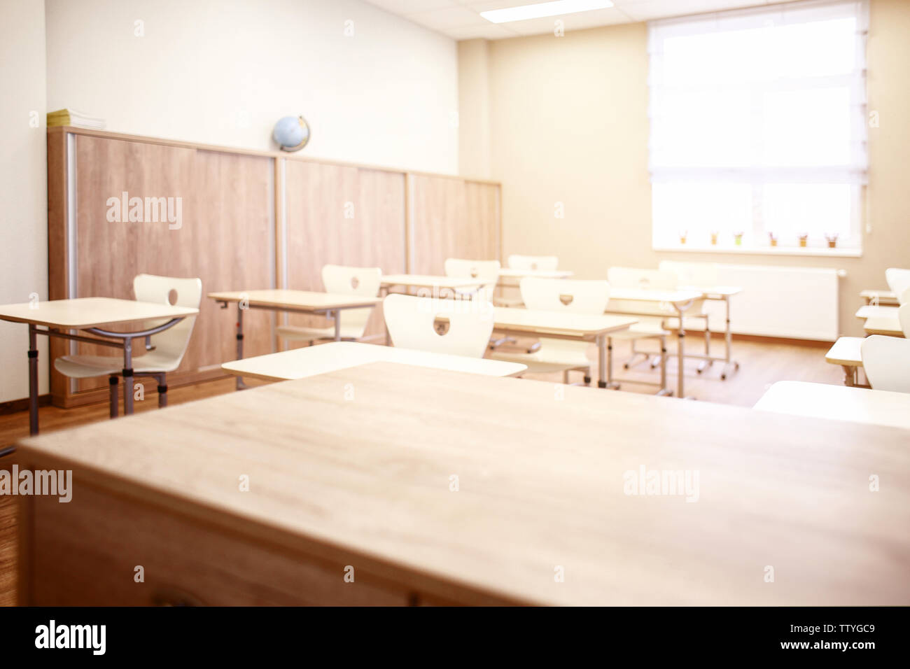 Empty classroom with chairs and desks Stock Photo - Alamy