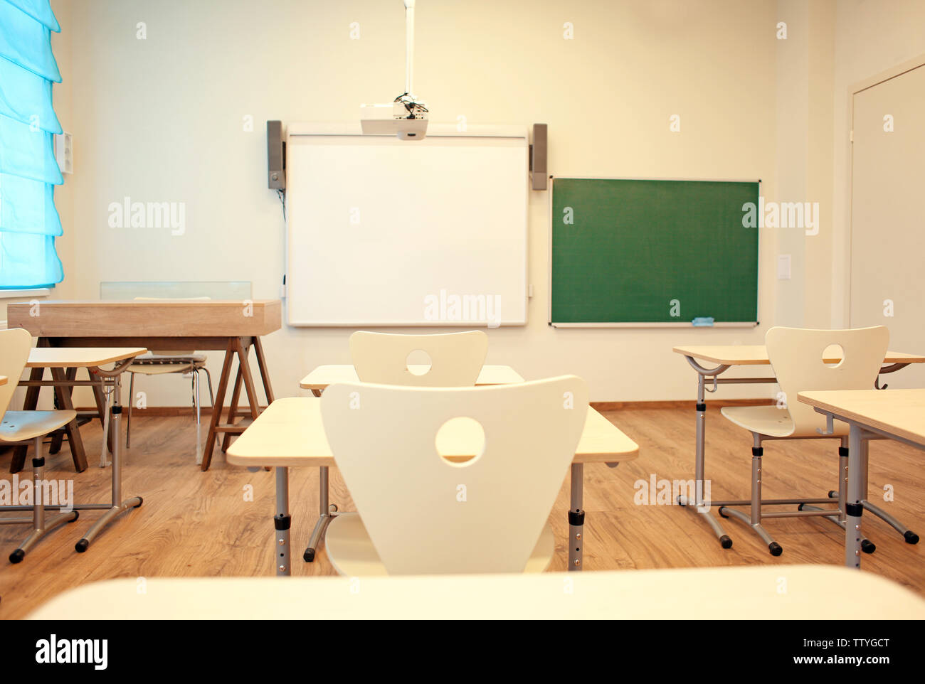 Empty classroom with chairs and desks Stock Photo - Alamy