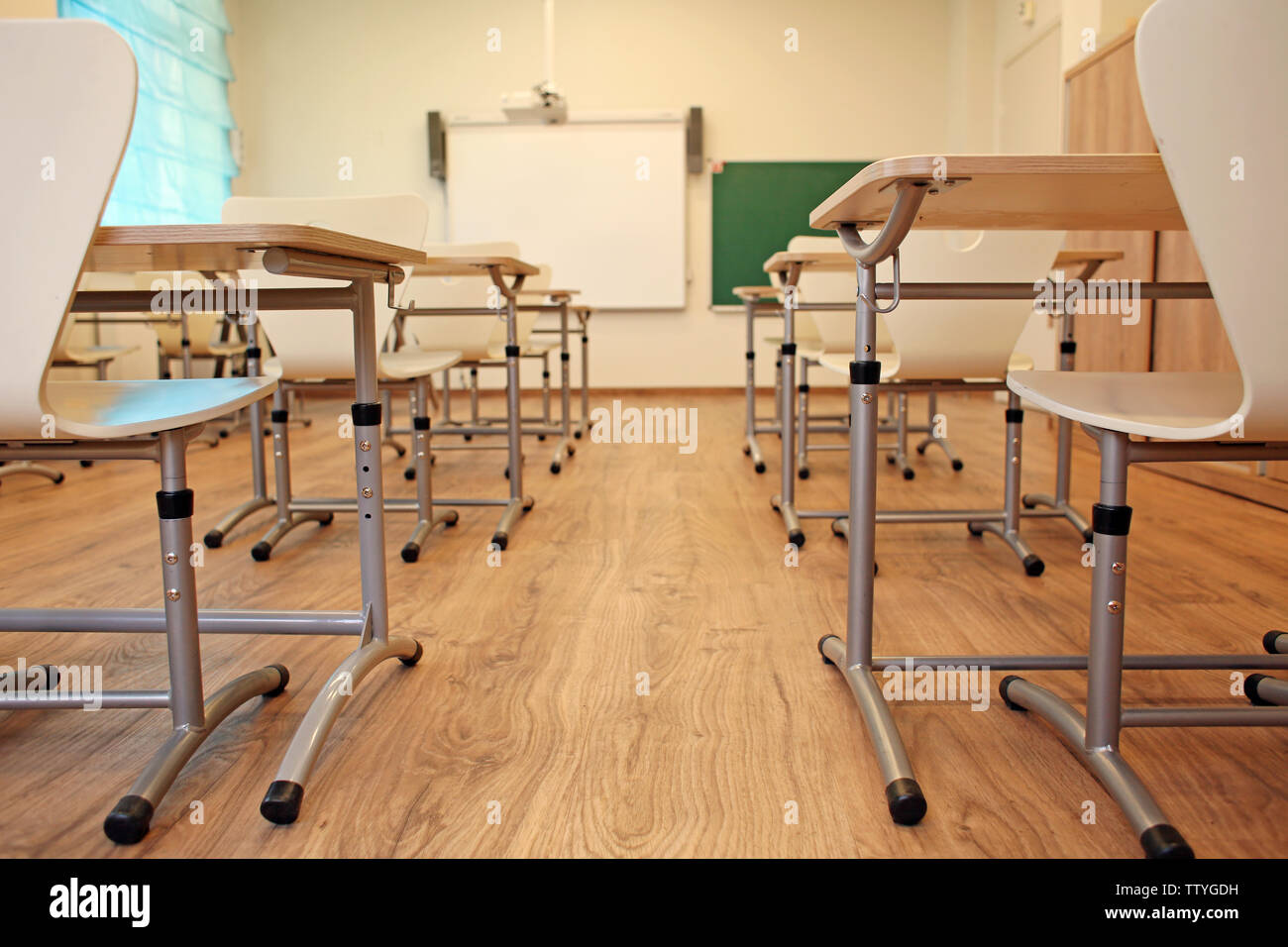 Empty classroom with chairs and desks Stock Photo - Alamy