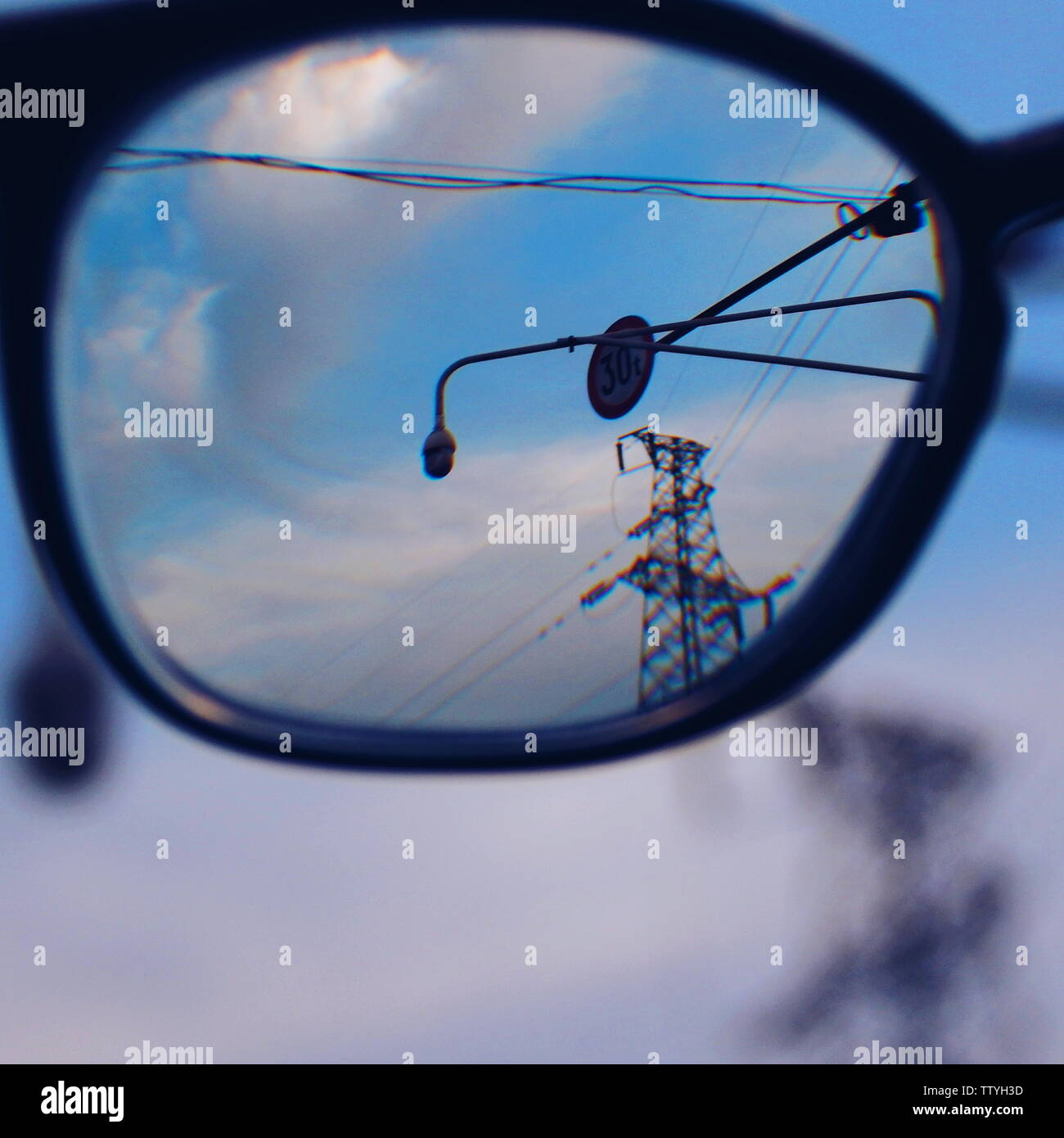 Look at the world through glasses Stock Photo - Alamy