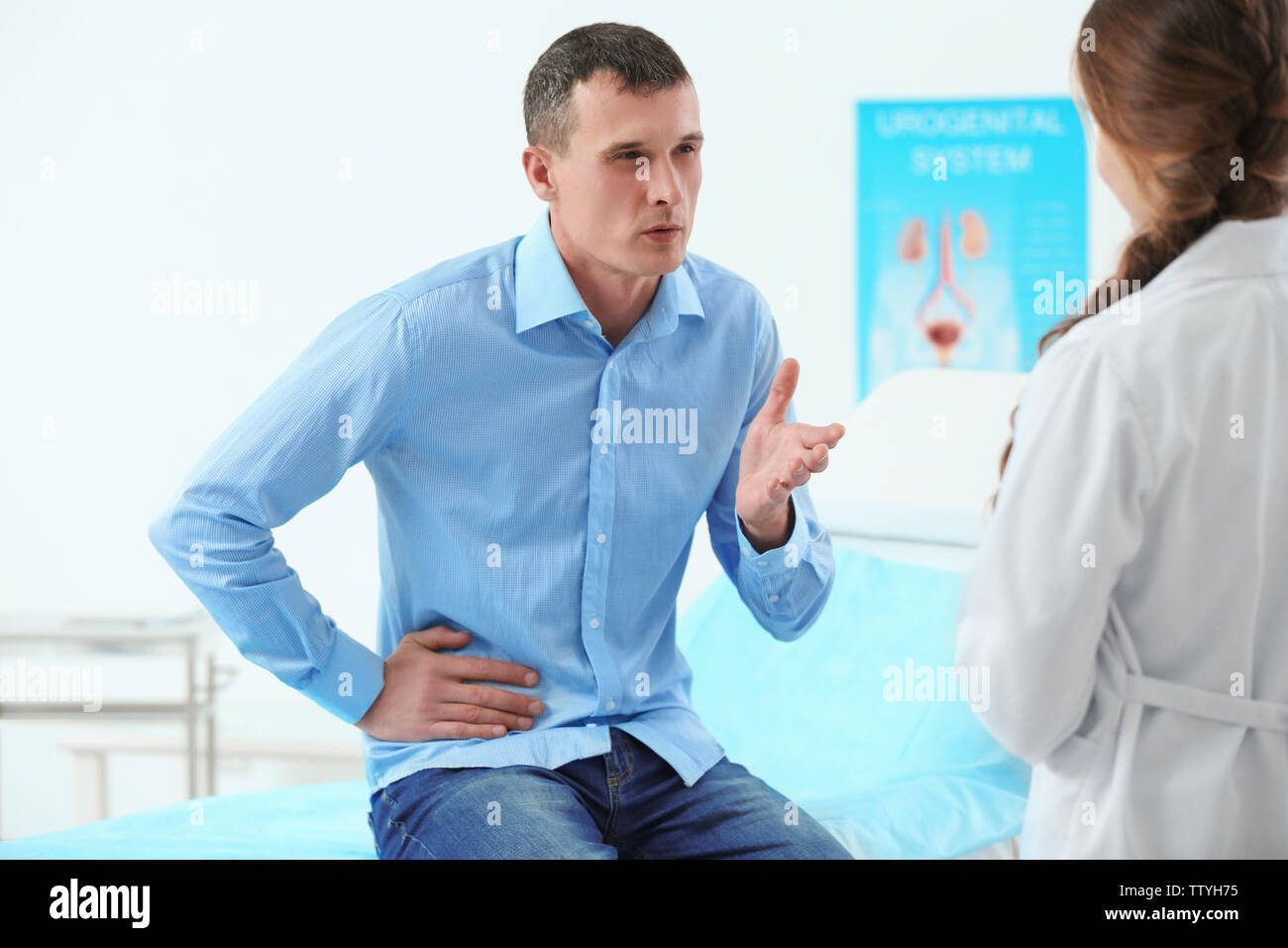 Patient talking with doctor at hospital Stock Photo - Alamy