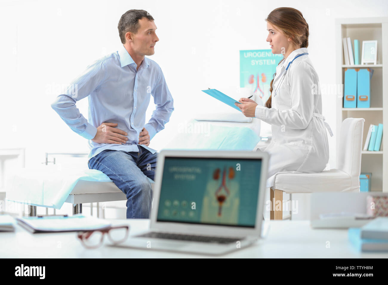 Man visiting doctor at hospital Stock Photo - Alamy