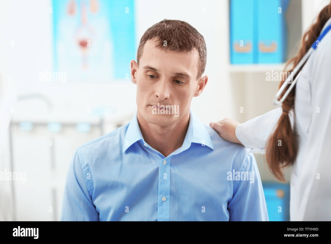Man visiting doctor at hospital Stock Photo - Alamy