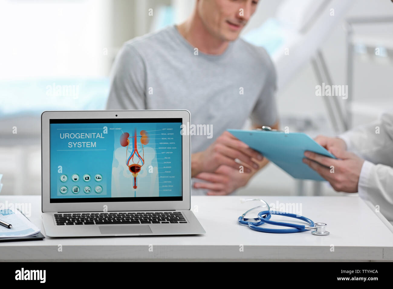 Medical concept. Laptop screen with urology system image on doctor's ...