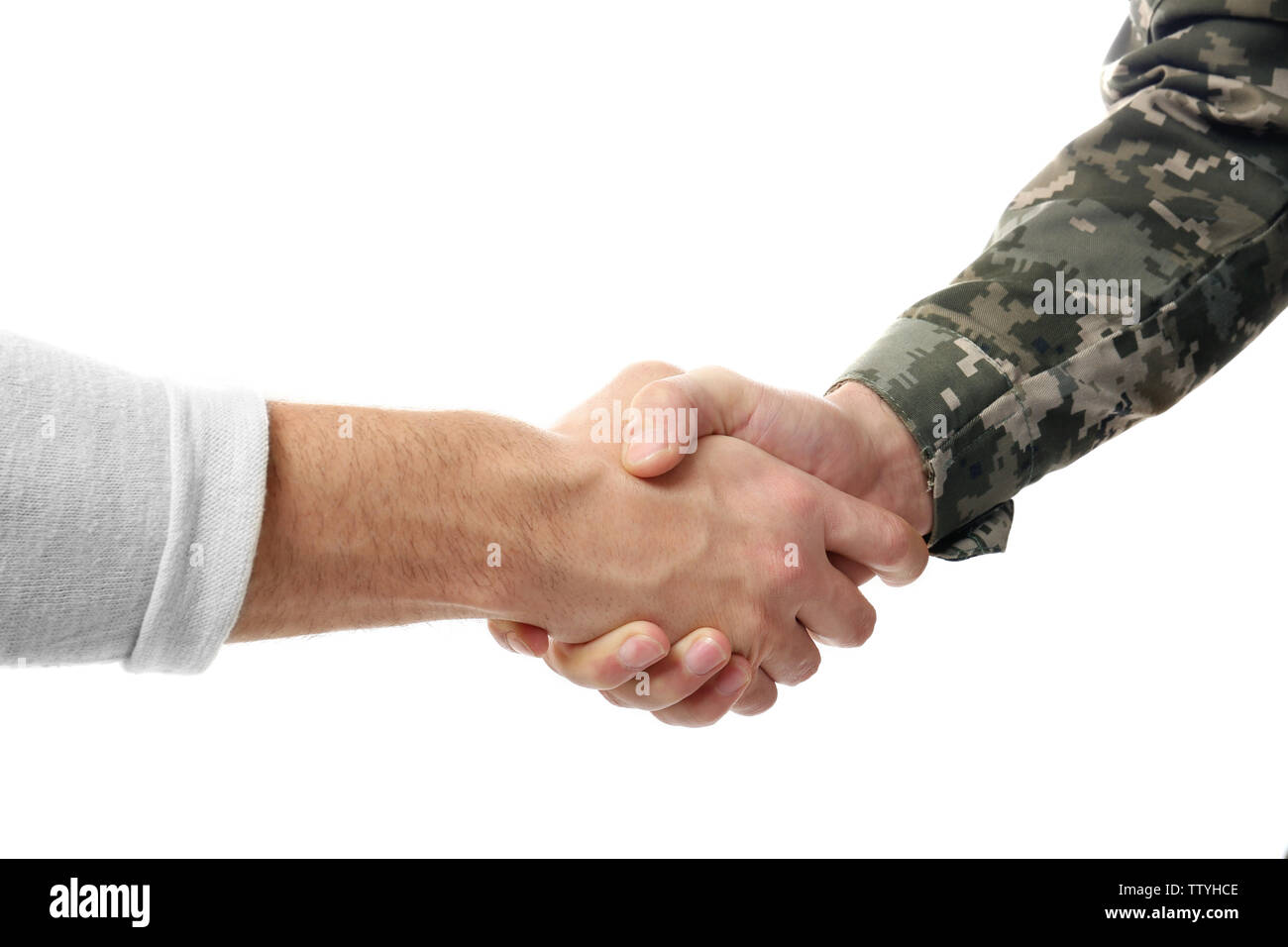 Soldier and civilian shaking hands on white background, closeup Stock ...