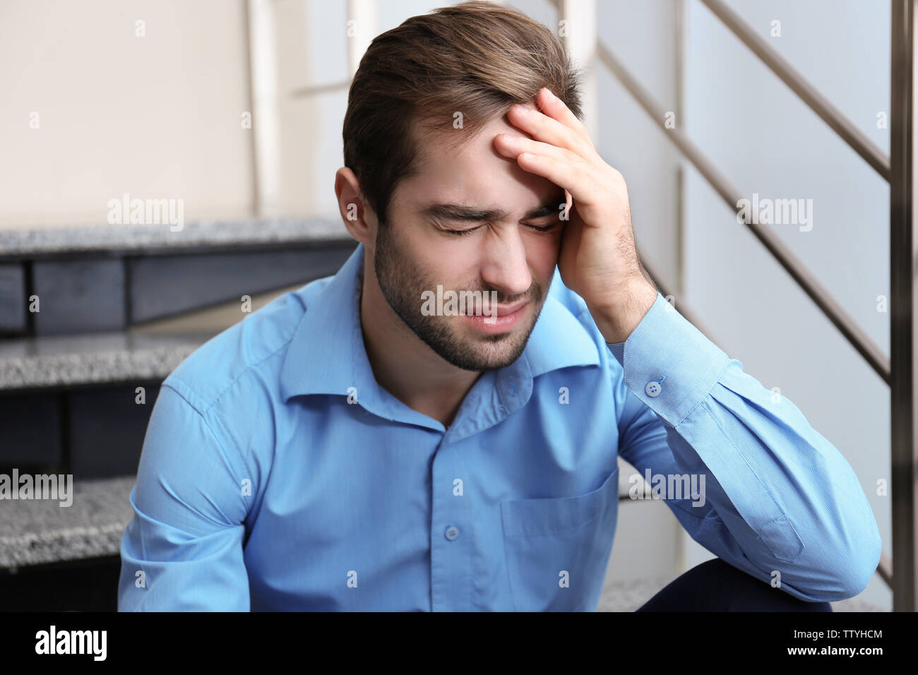 Office worker sitting on stairs hi-res stock photography and images - Alamy