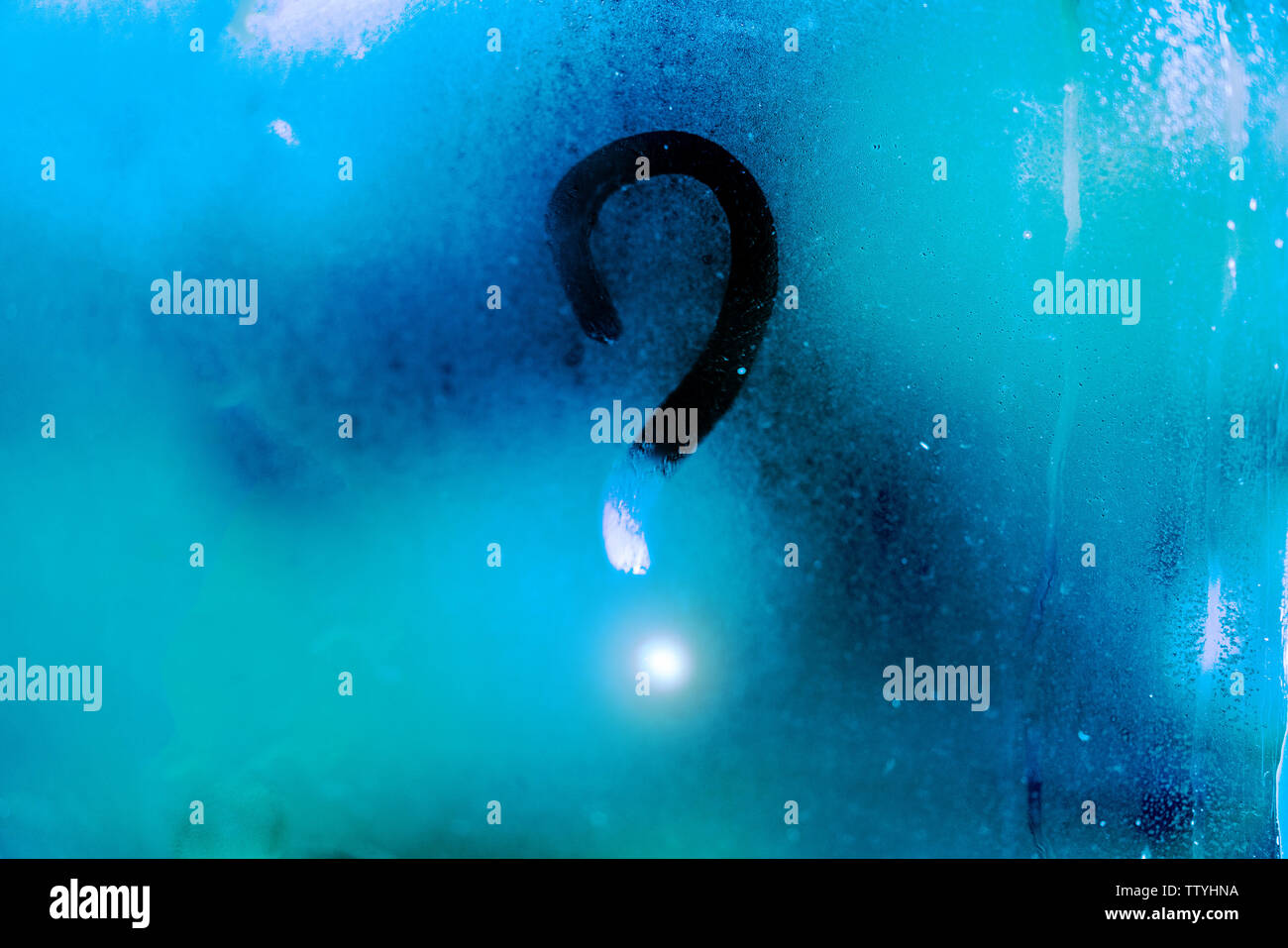 the inscription on the sweaty glass - question mark. Copy space Stock ...