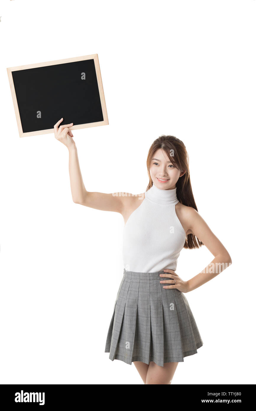 Beautiful cute college student against white background Stock Photo - Alamy