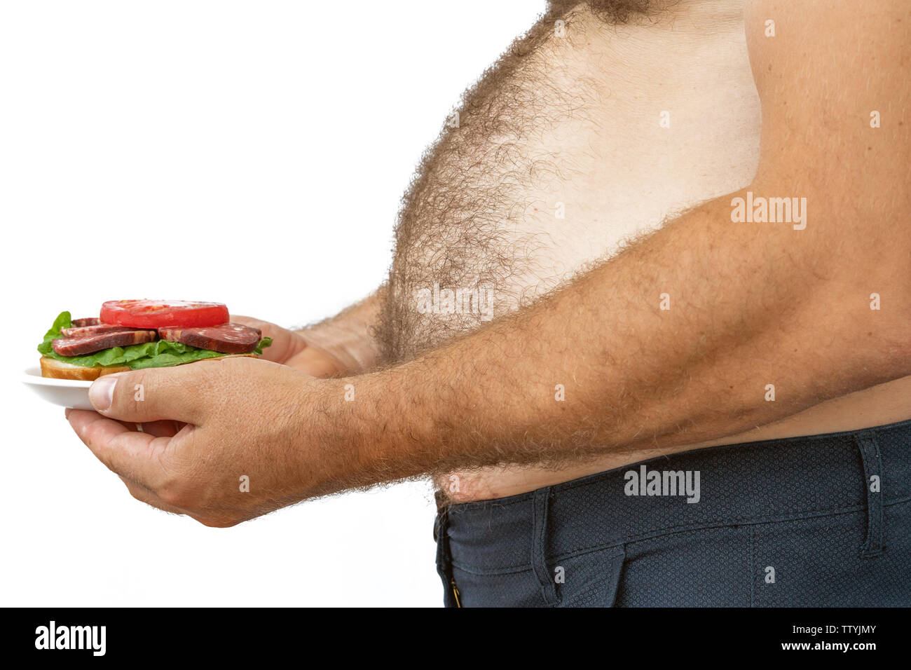 man with overweight. symbolic photo for beer belly, unsuccessful ...