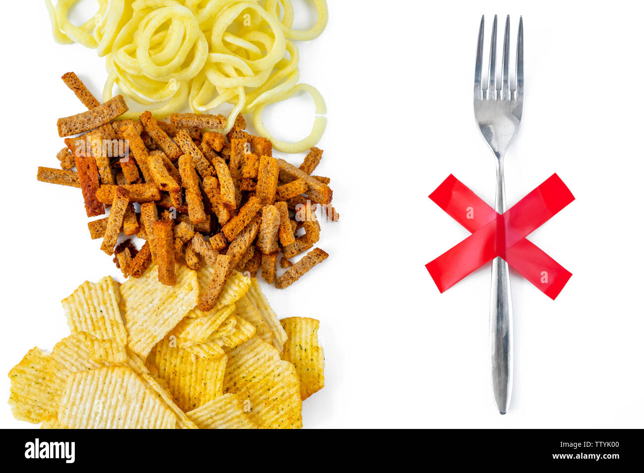 Assortment of Unhealthy Snacks: chips, onion rings, onion rings and ...