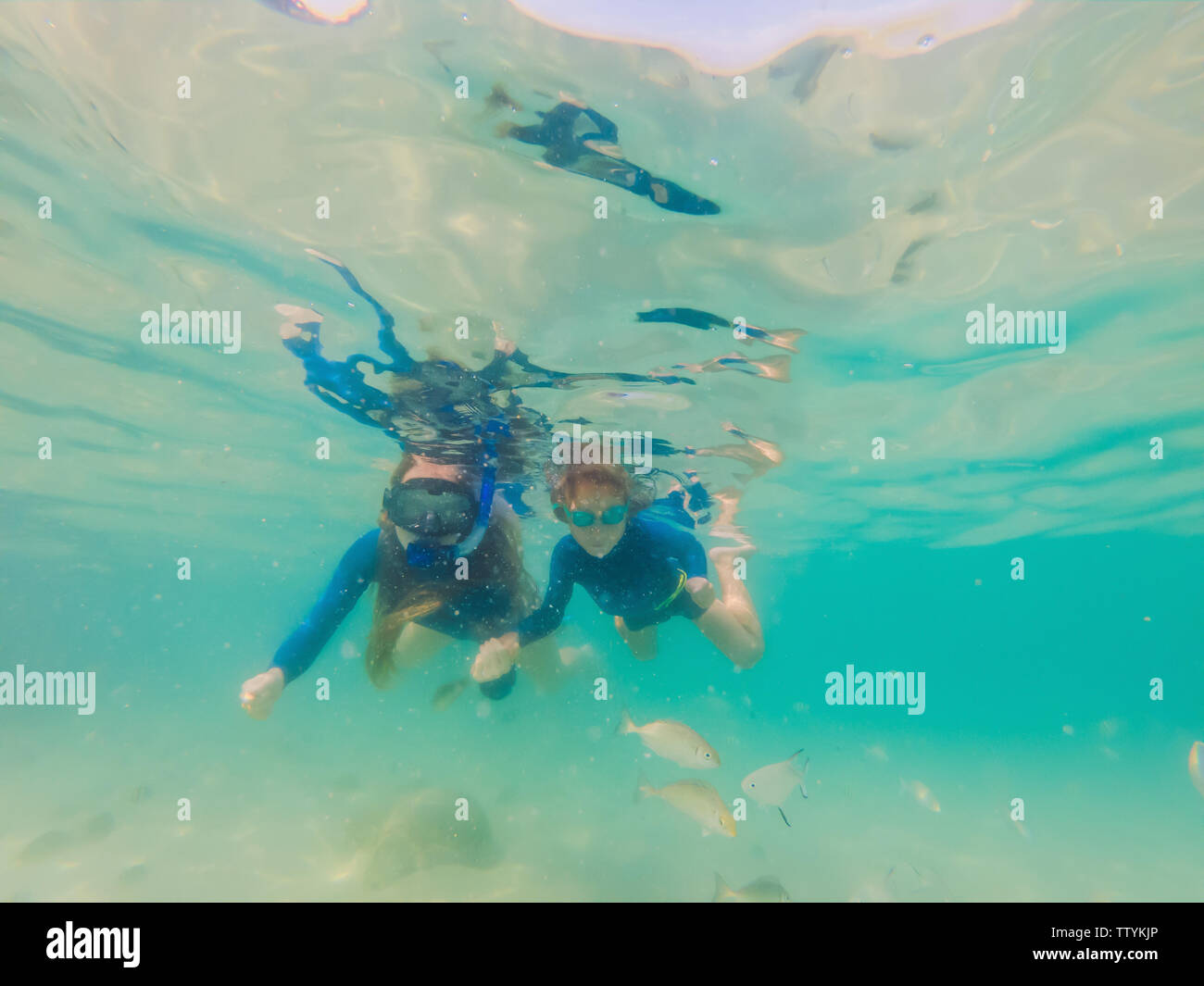 Mother Daughter Snorkeling In Sea High Resolution Stock Photography and ...
