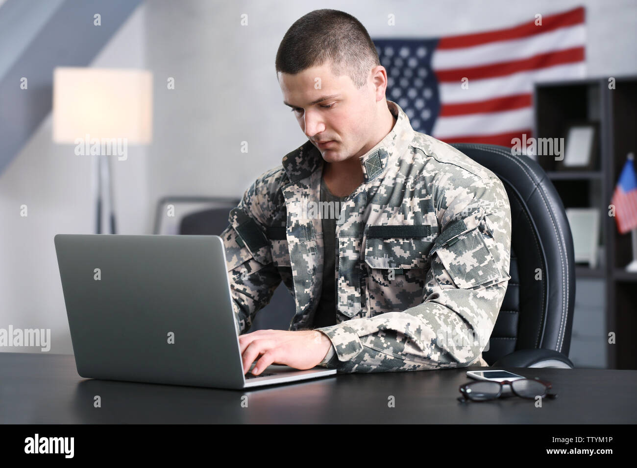 Sitting military army soldier technology communication hi-res stock ...