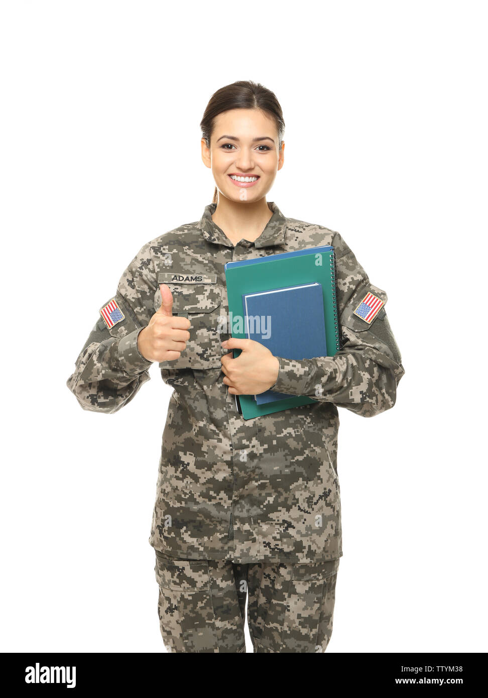 Pretty female cadet of military school on white background Stock Photo ...